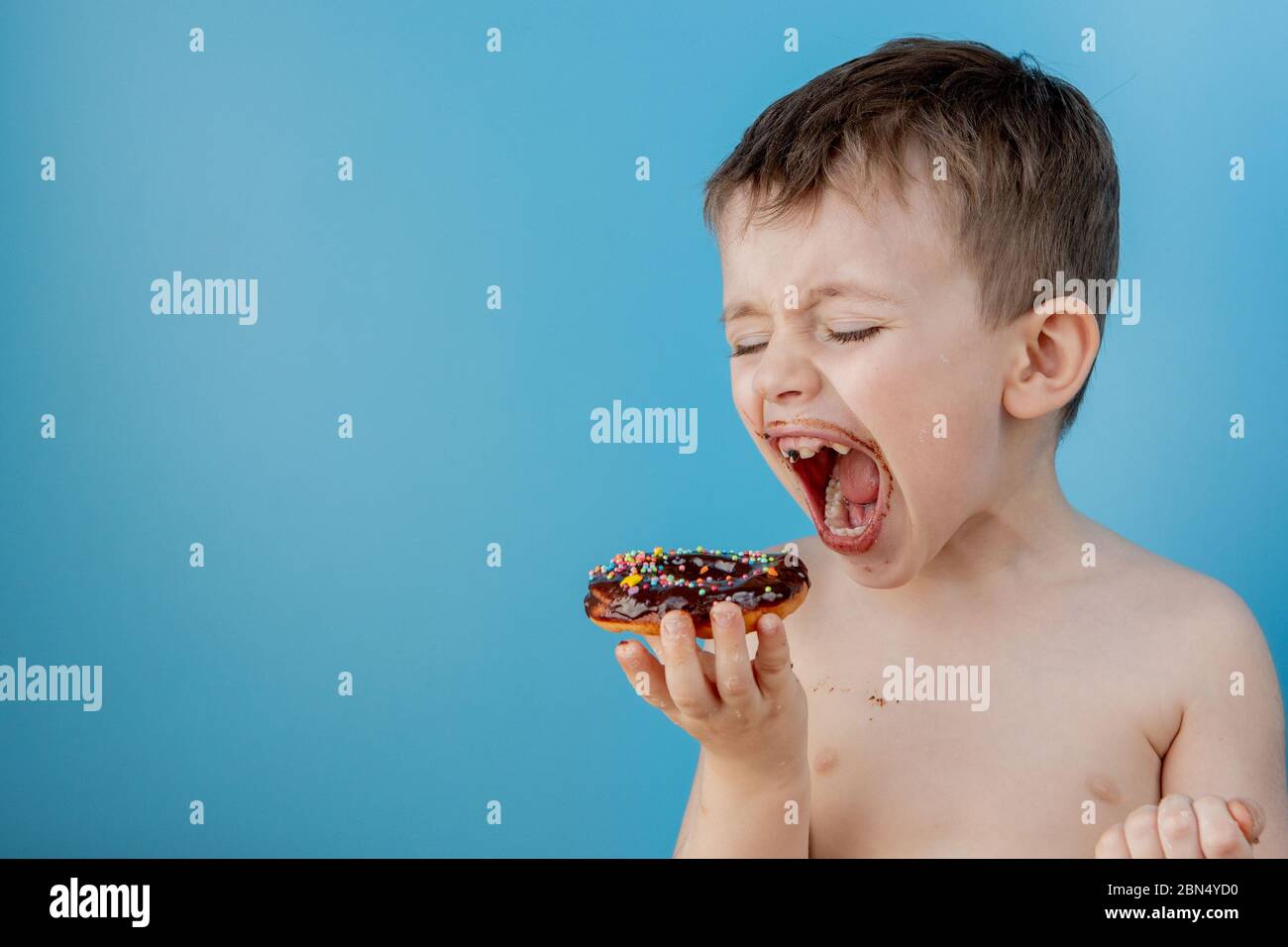 Boy eat chocolate child choco kid hi-res stock photography and images ...