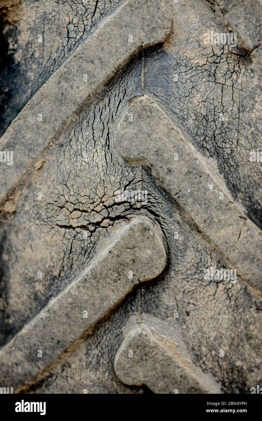 Detail of an old, cracked tractor tire Stock Photo - Alamy