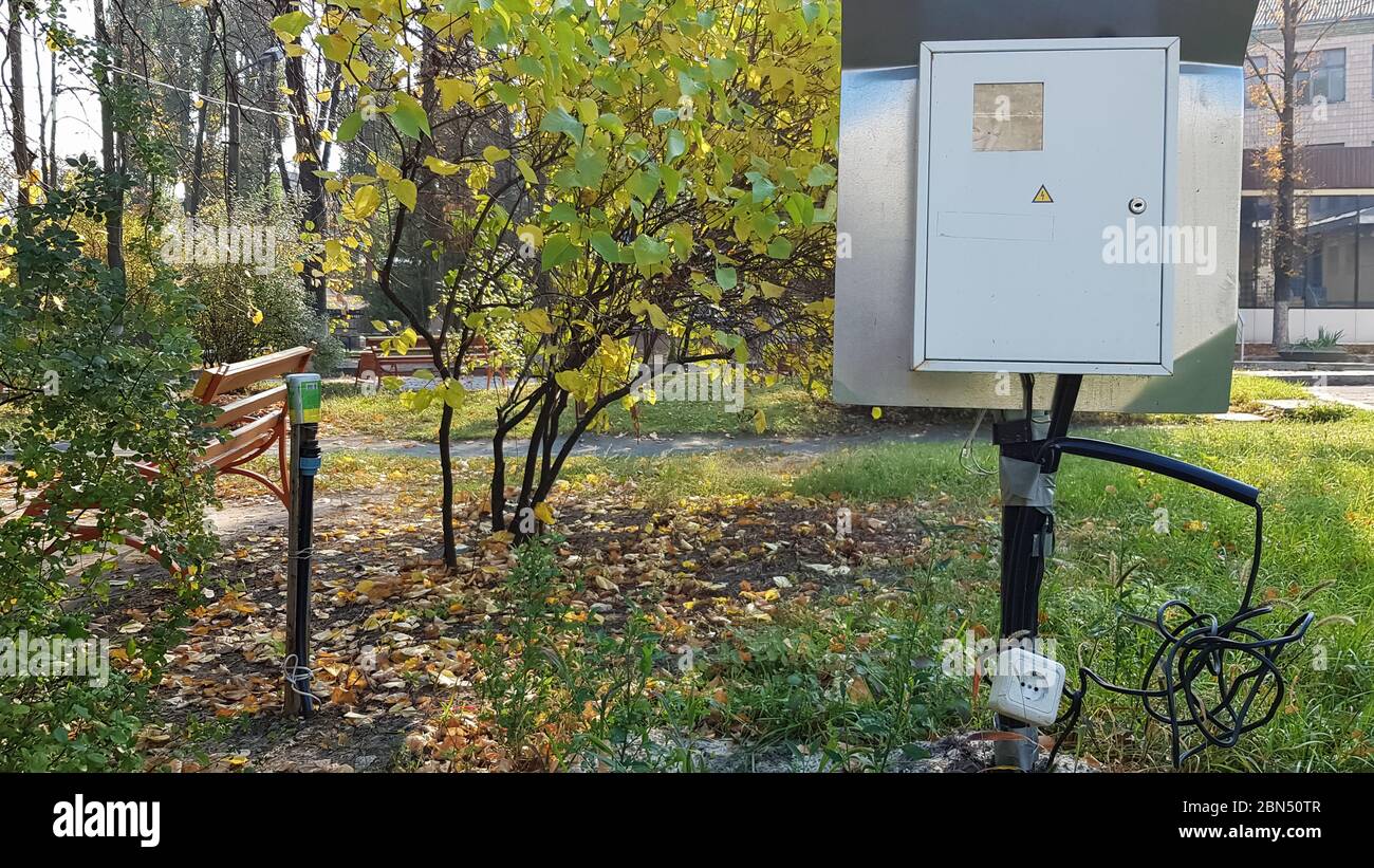 Old electric panel on the street. Outdated electrical equipment ...