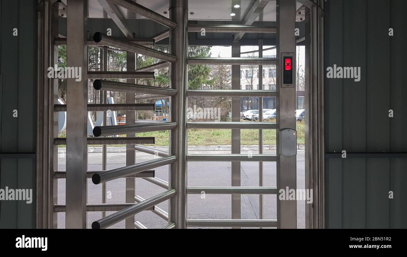 Full-size turnstile, guarded entrance. Revolving door. Card key ...