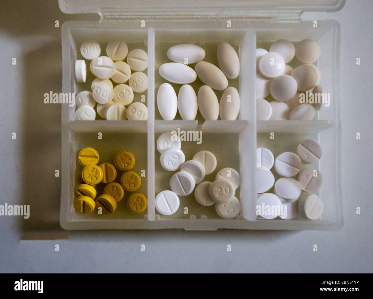 Rx medications in a plastic pill case Stock Photo - Alamy