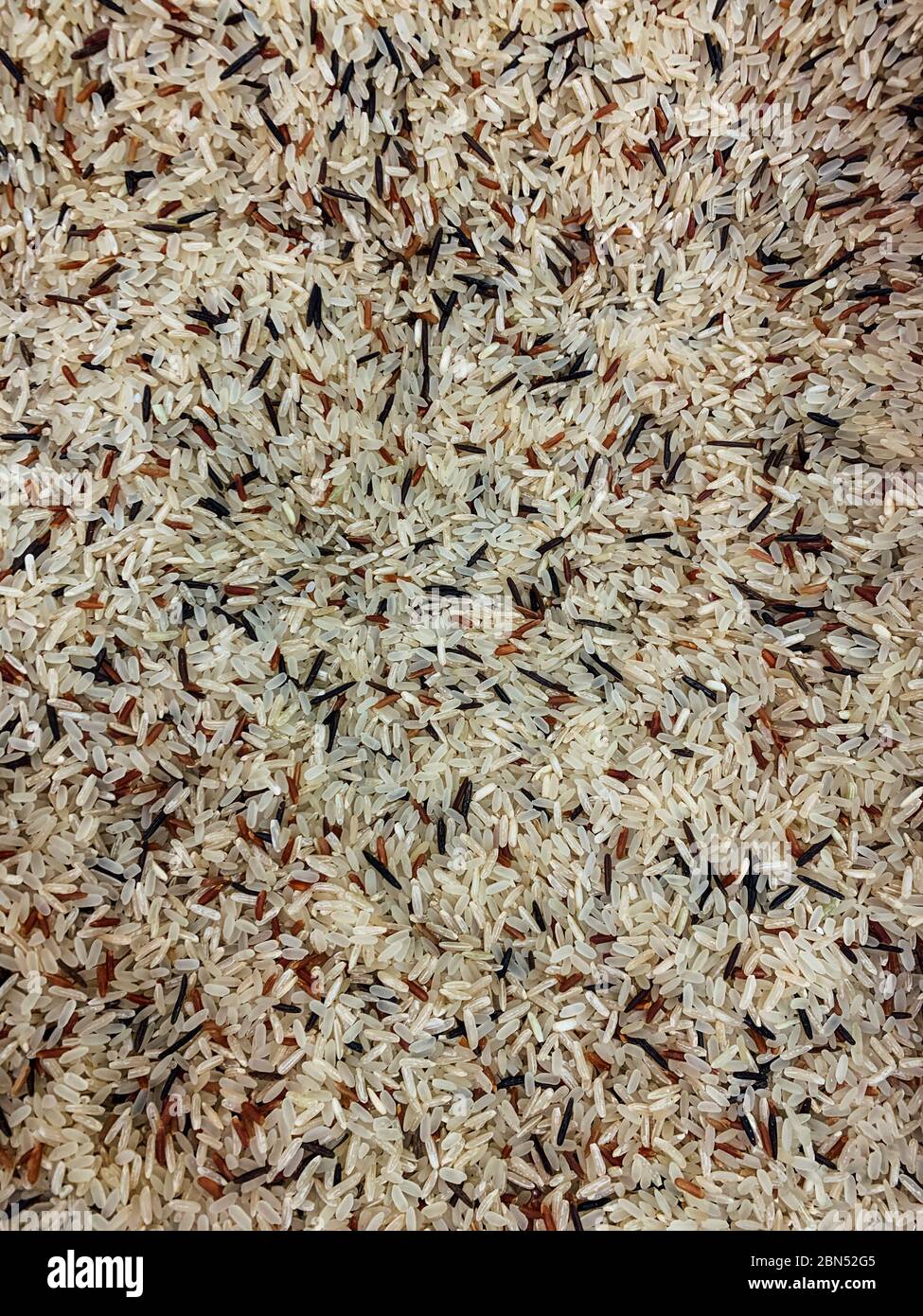 lots of rice to make delicious food the background Stock Photo - Alamy