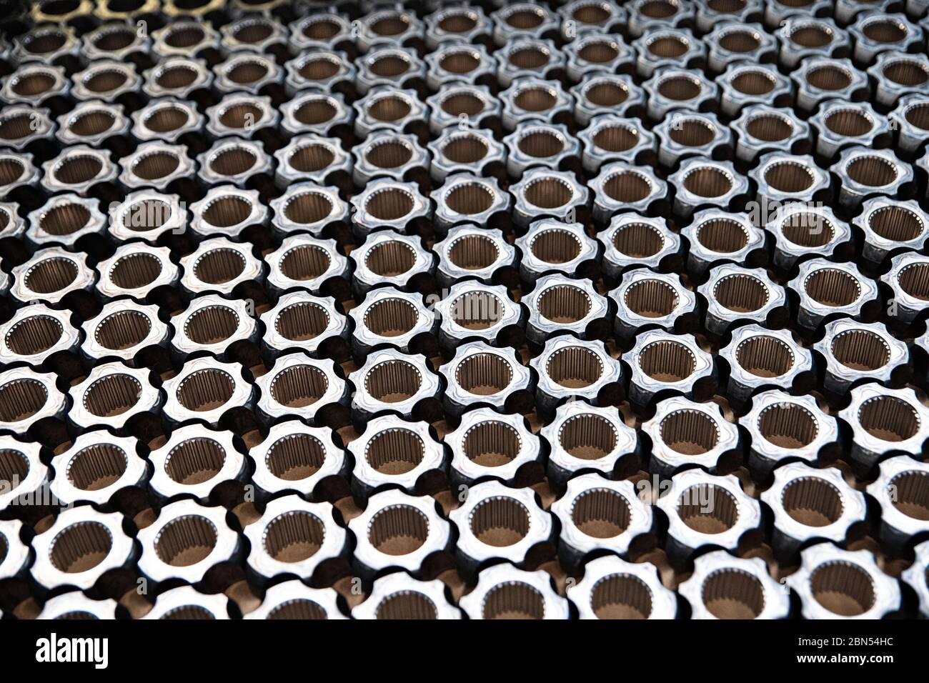 Machine parts. Axles on a factory stack Stock Photo - Alamy