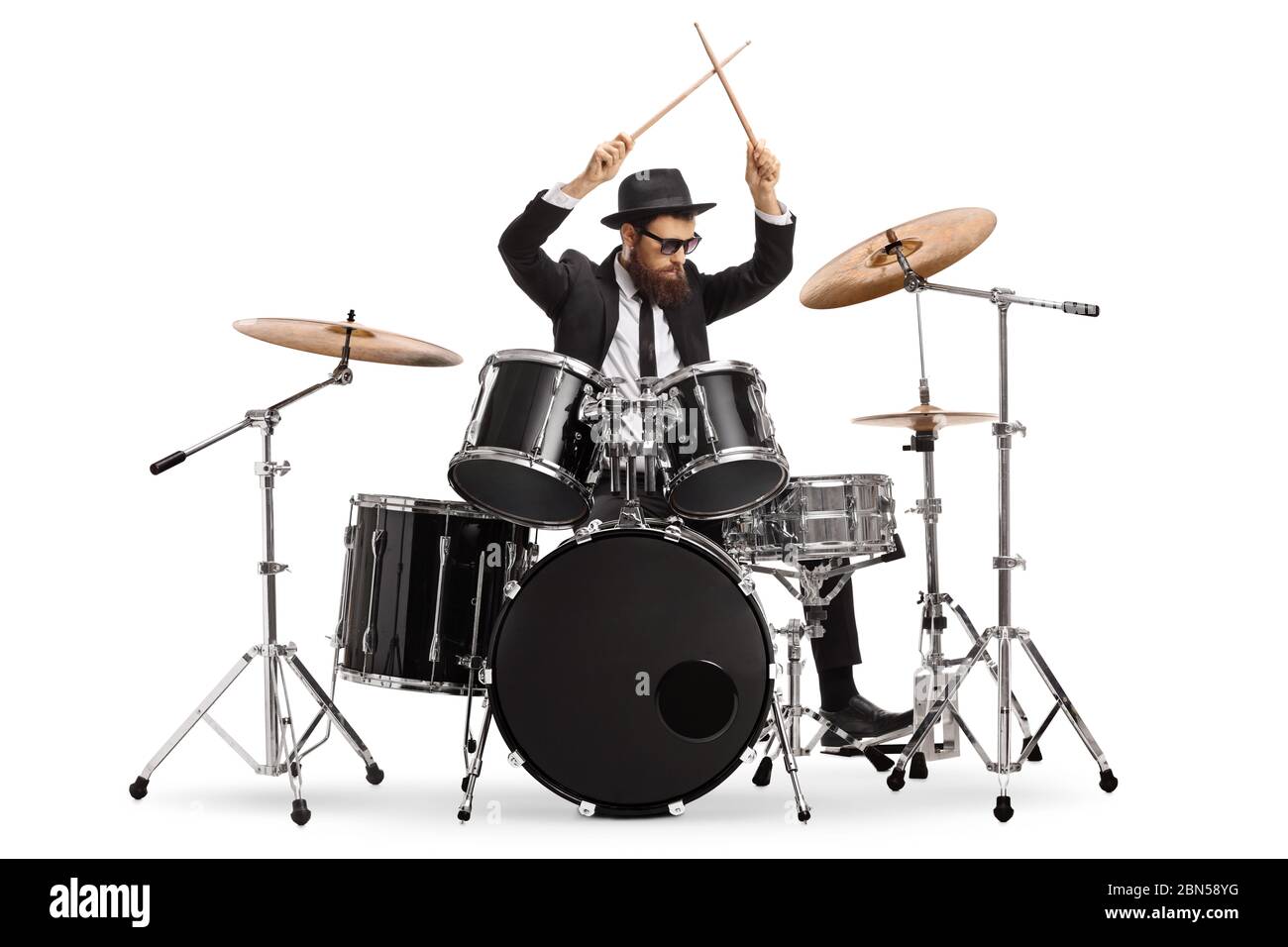 Drummer starting to play drums and holding drumsticks in the air ...