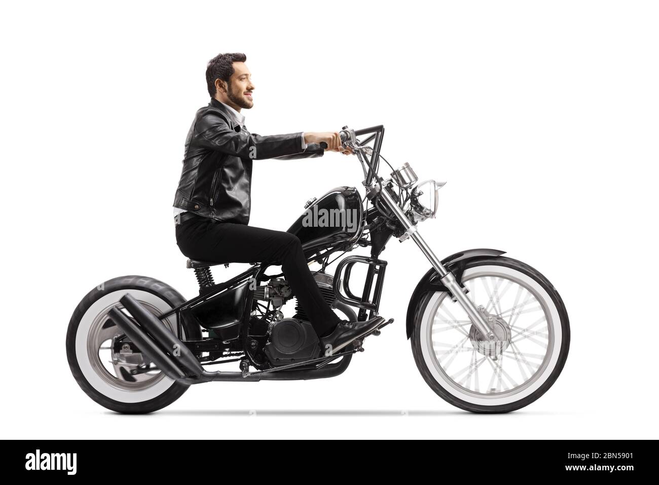 Young man in leather jacket riding a chopper motorbike isolated on ...