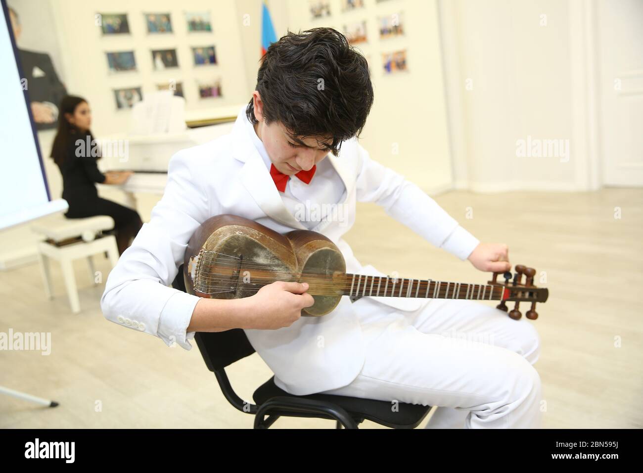 Tar string instrument . Man playing on a classical folk instrument tar ...