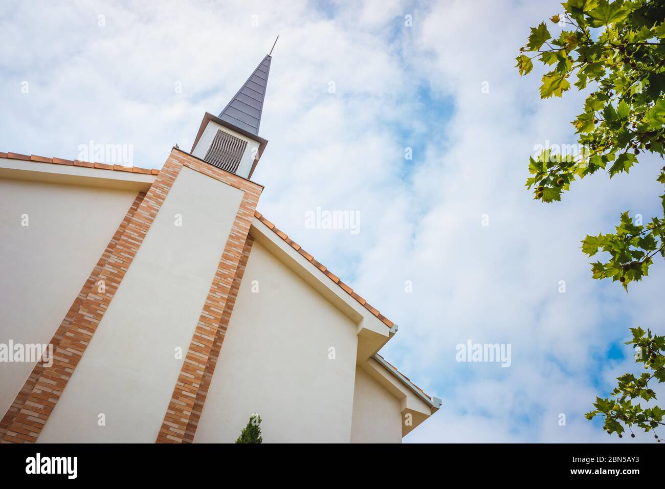 Building facade of a traditional American Protestant church with clock ...