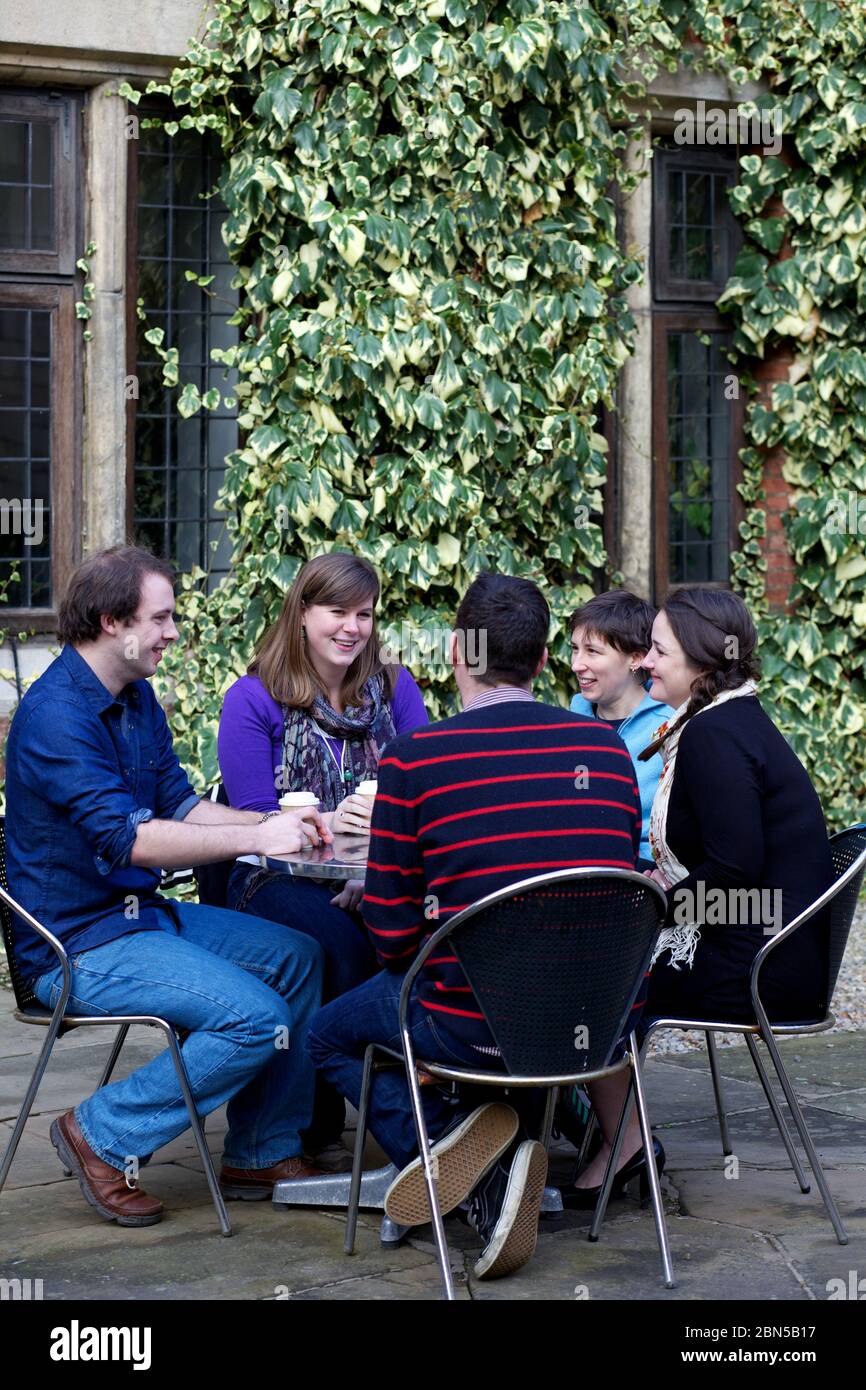 Friends meet up for a coffee Stock Photo - Alamy