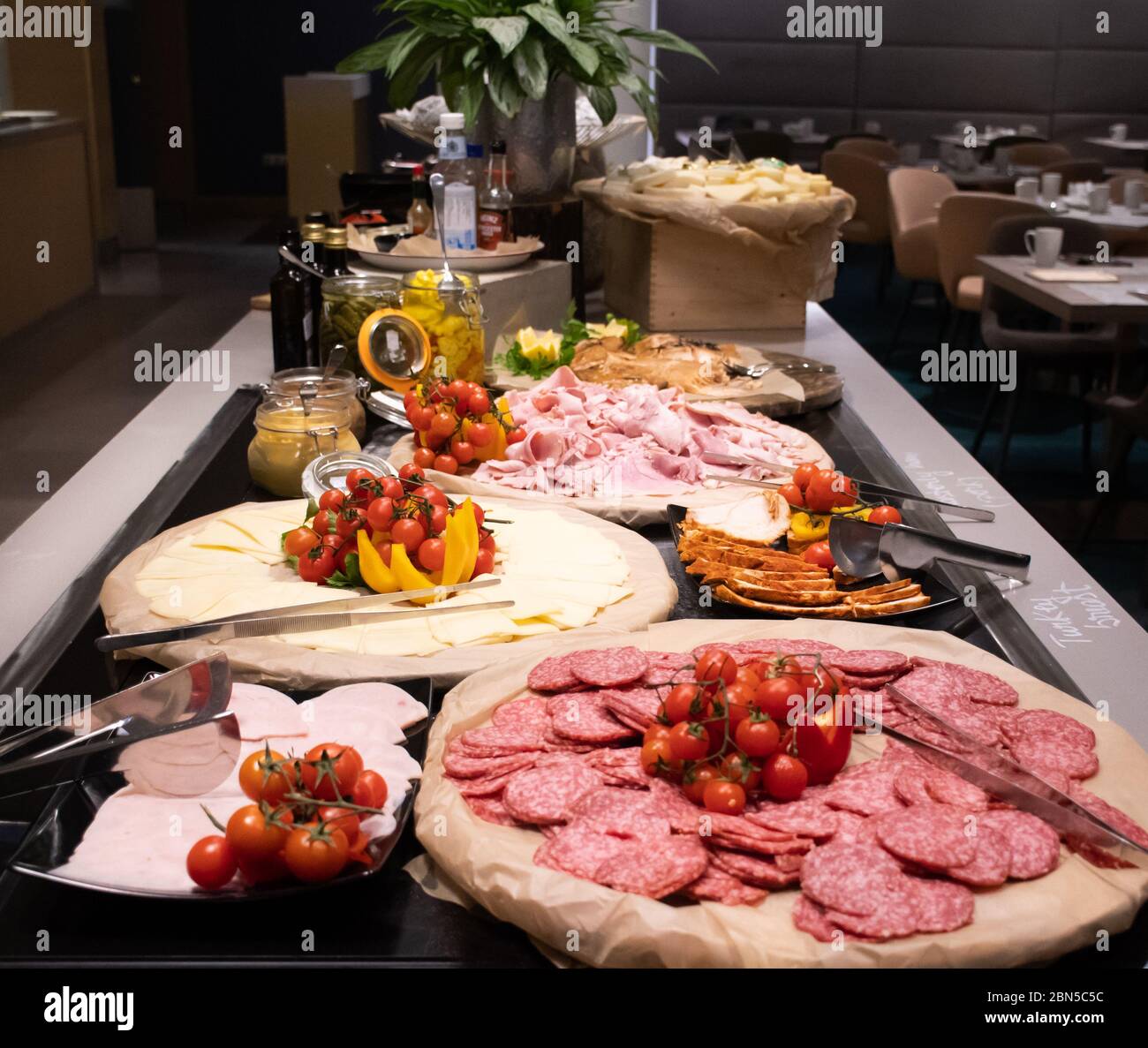 Selection of self service catering continental breakfast buffet display ...