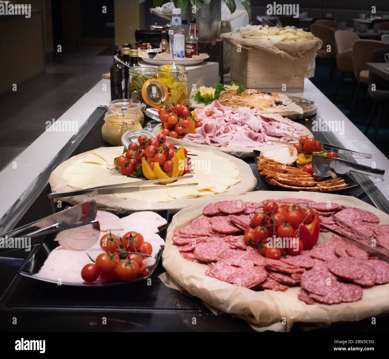 Selection of self service catering continental breakfast buffet display ...