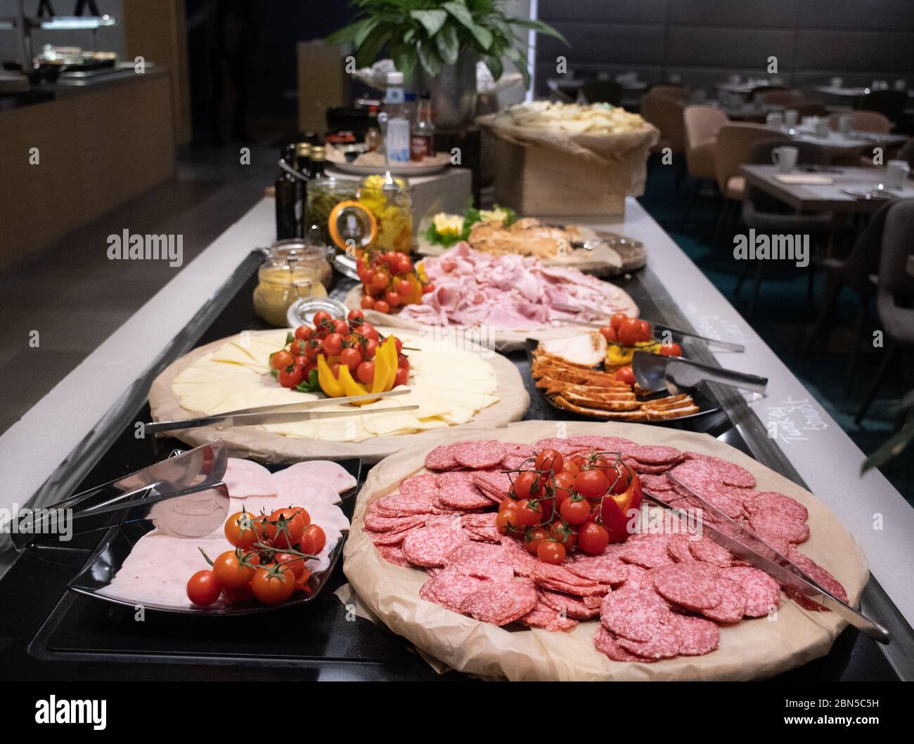 Selection of self service catering continental breakfast buffet display ...