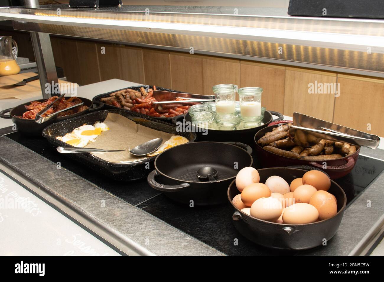 Selection of self service catering continental breakfast buffet display ...