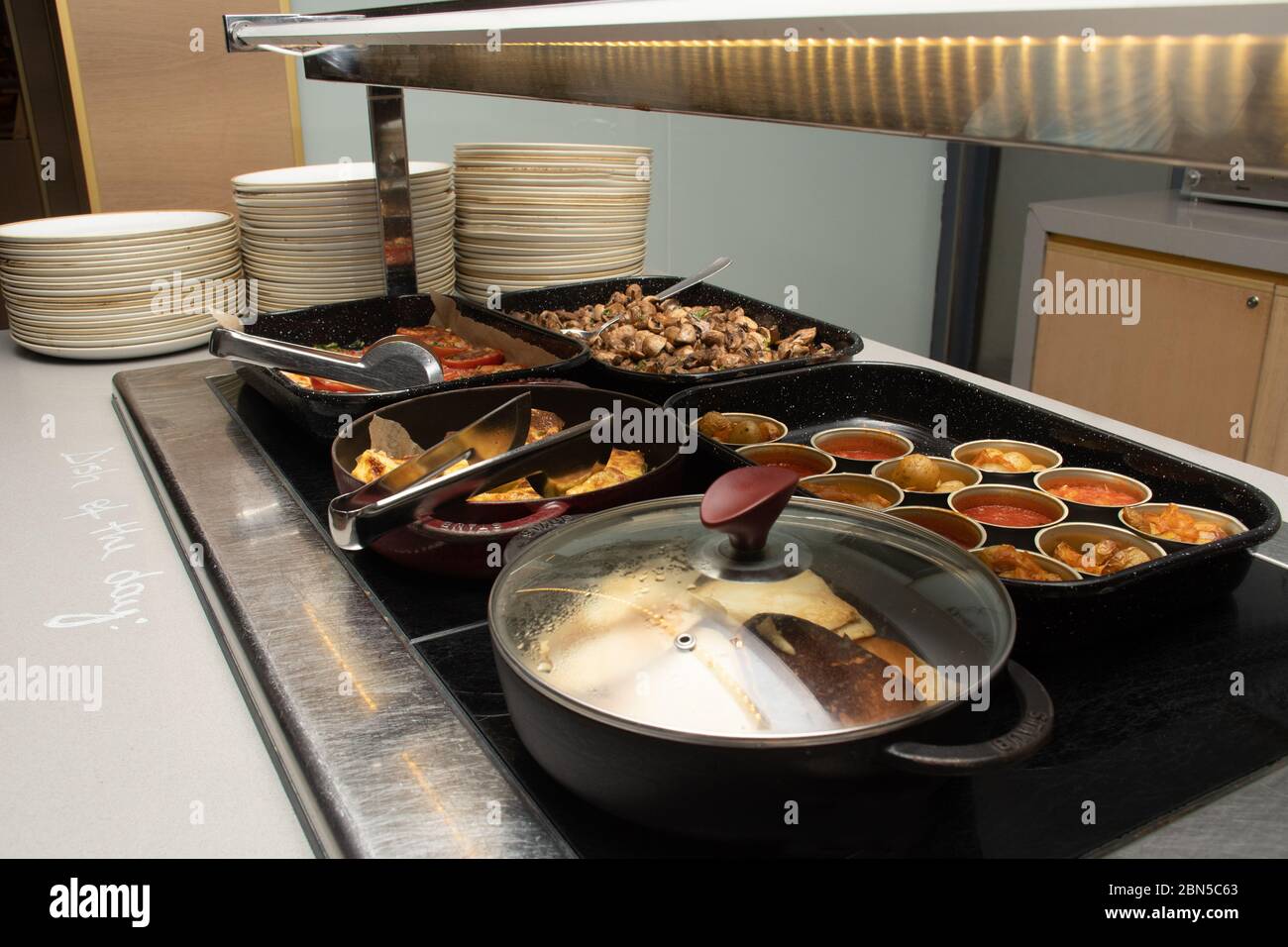 Selection of self service catering continental breakfast buffet display ...