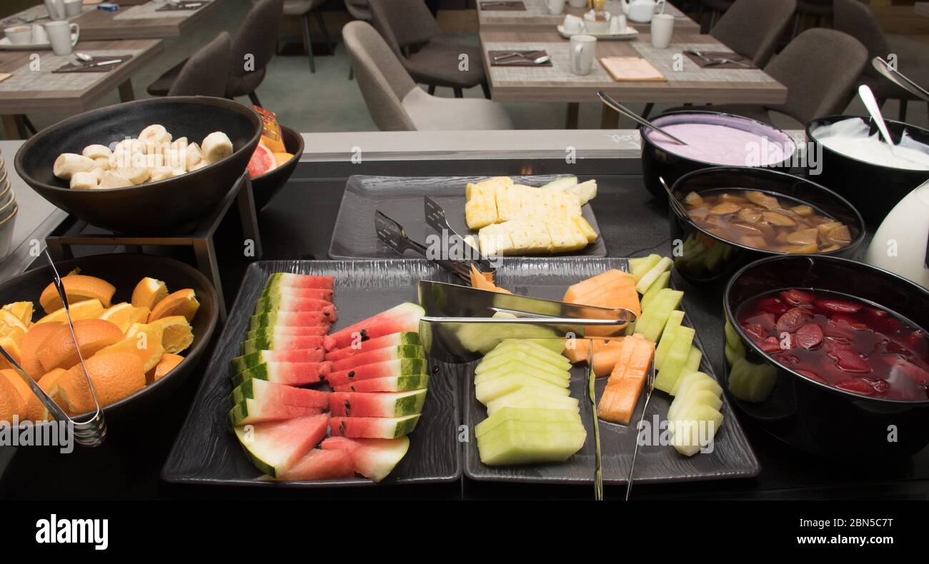 Selection of self service catering continental breakfast buffet display ...