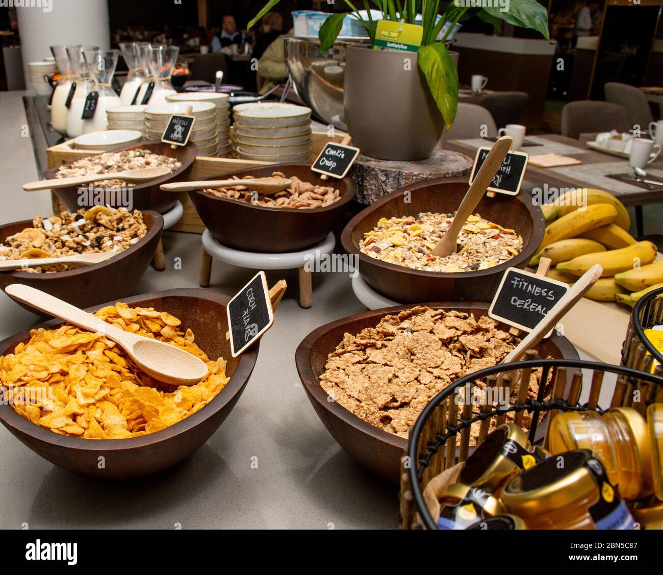 Selection of self service catering continental breakfast buffet display ...