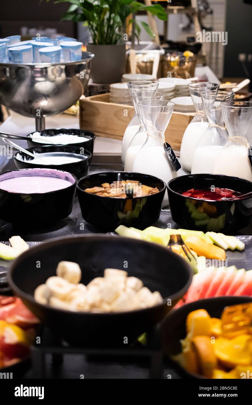 Selection of self service catering continental breakfast buffet display ...