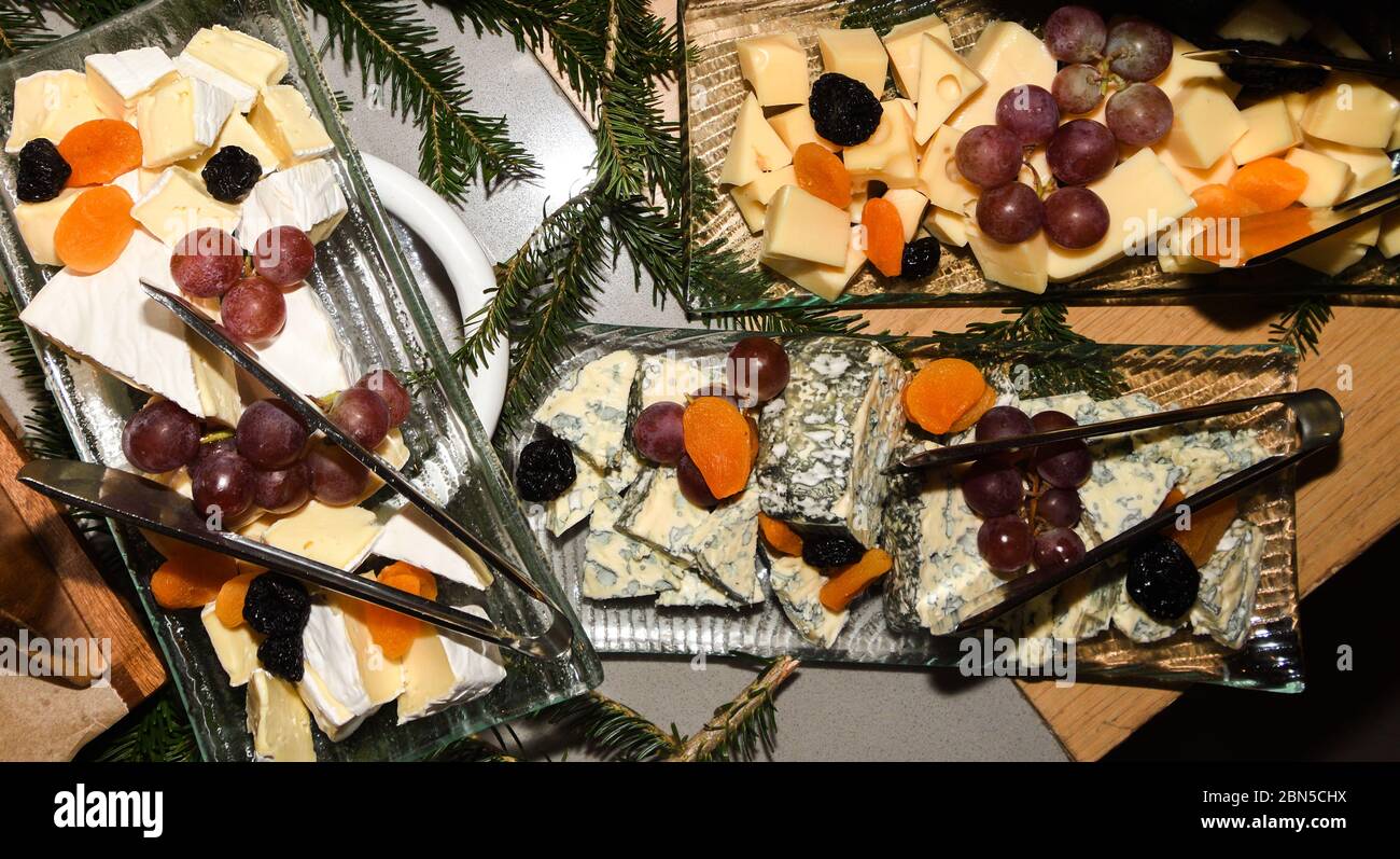 French cheese selection cuts on platters served during food brunch ...