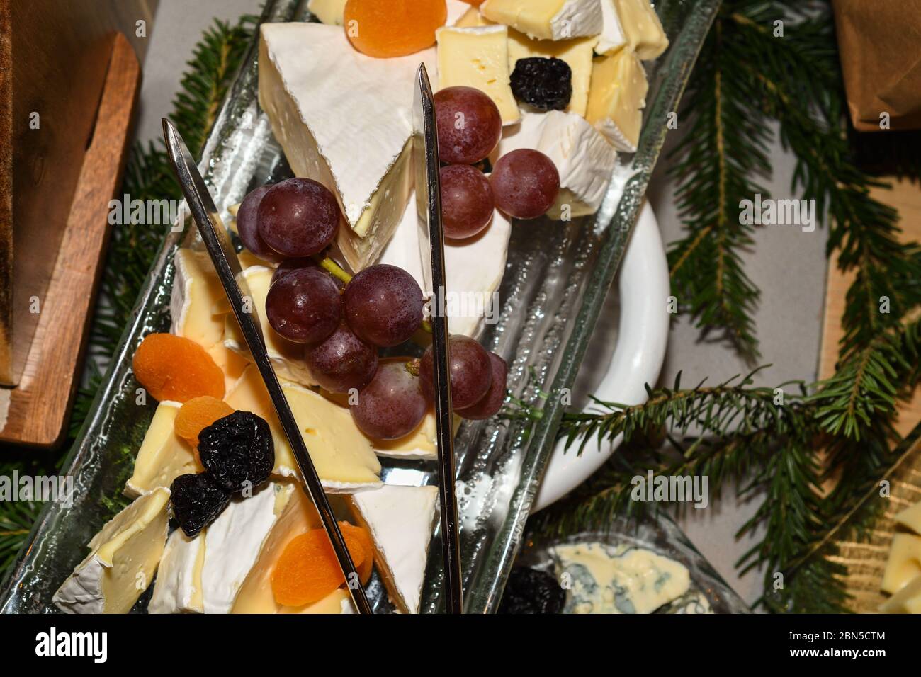 French cheese selection cuts on platters served during food brunch ...