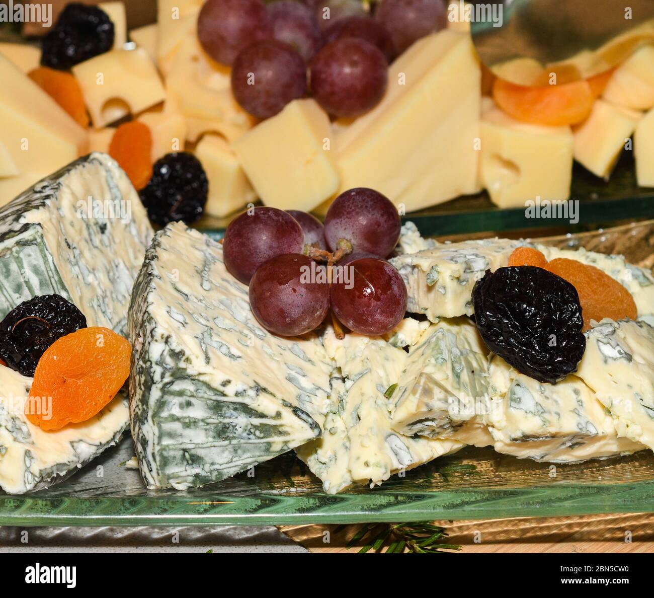 French cheese selection cuts on platters served during food brunch ...