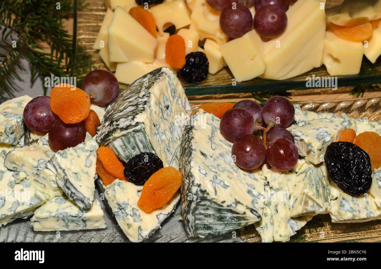 French cheese selection cuts on platters served during food brunch ...