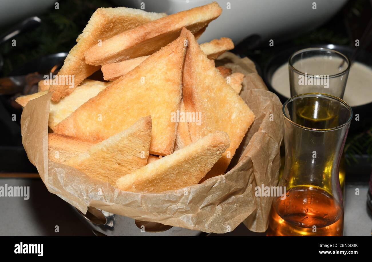 Toast bread in basket during morning breakfast buffet in hotel setting ...