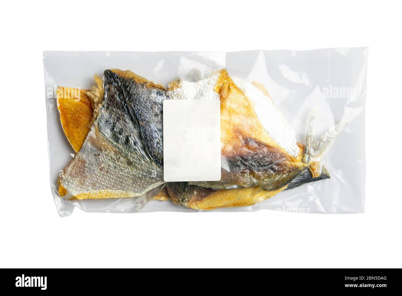 Dried bream in form butterfly in a transparent package with a white ...