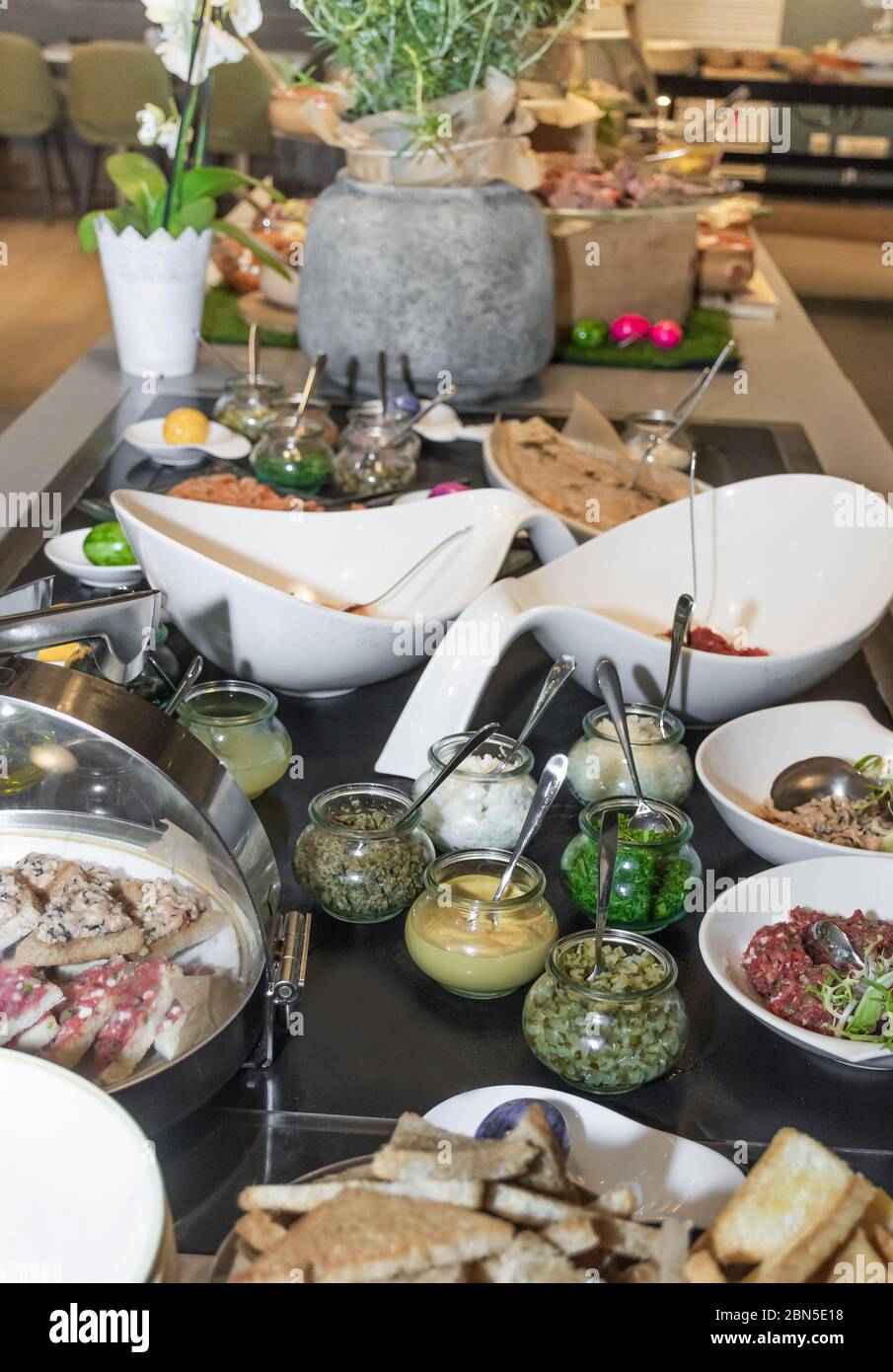 Tartar raw meat and fish brunch buffet easter bar table, in a hotel ...
