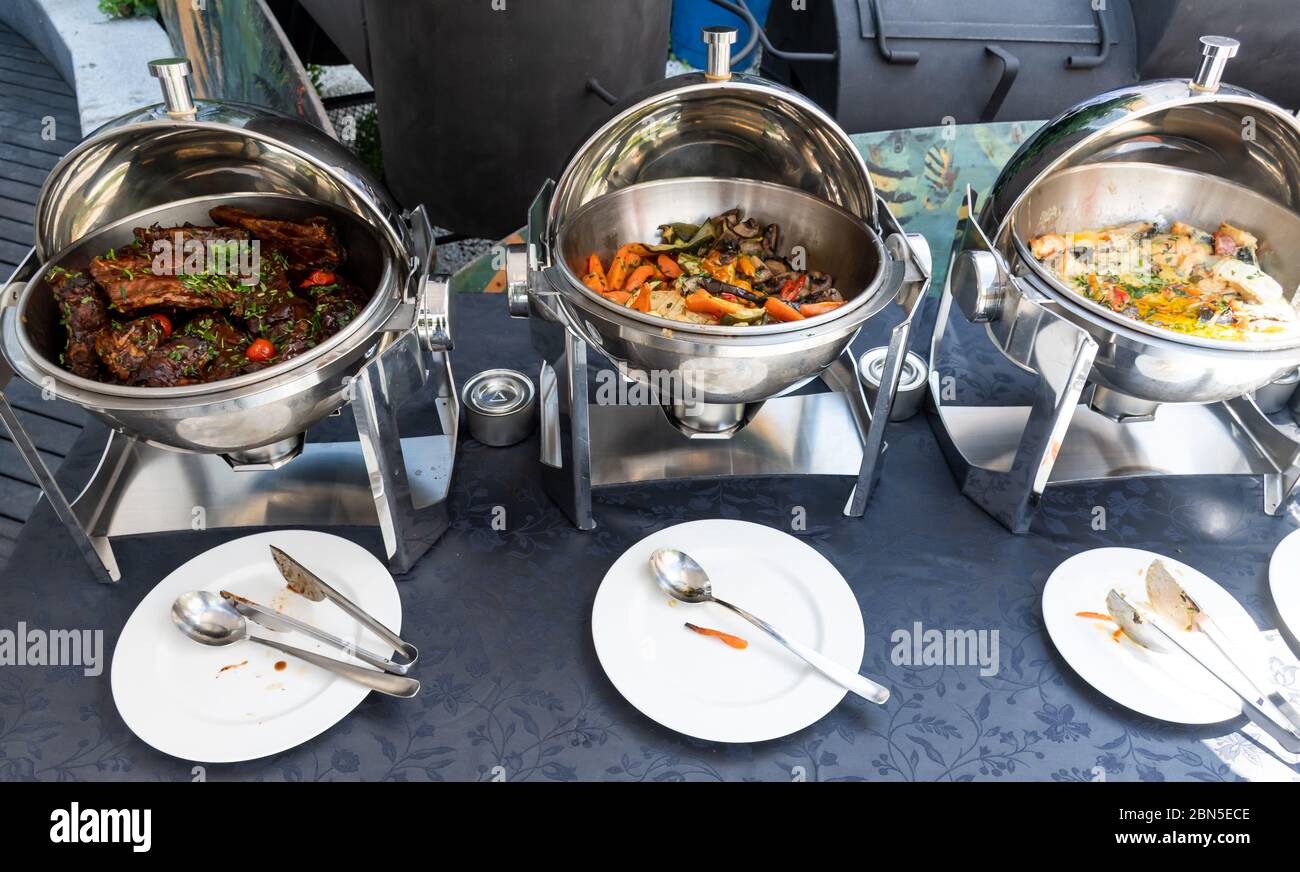 Live food stations. Kitchenware in the line catering summer brunch ...