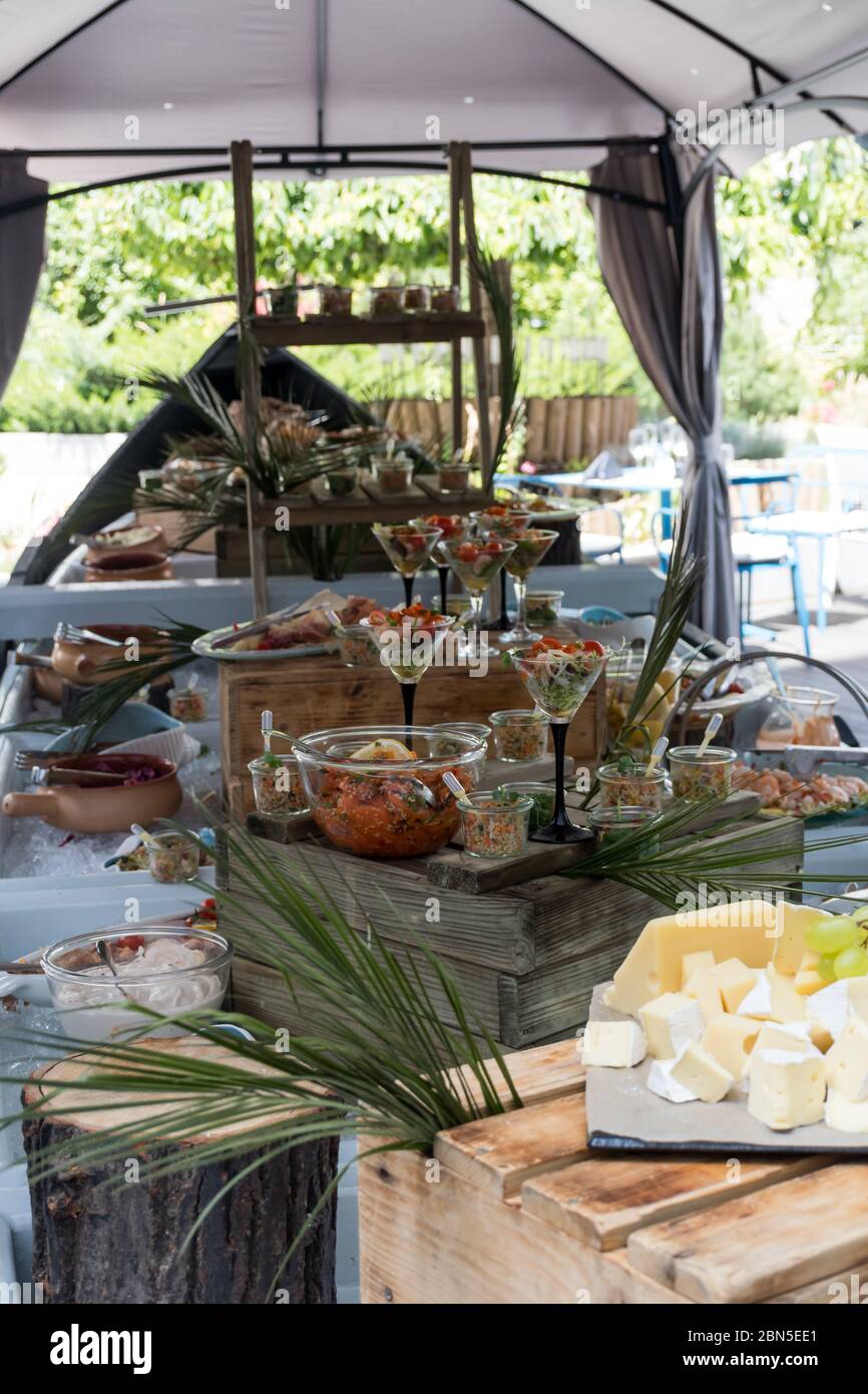 Live food stations. Kitchenware in the line catering summer brunch ...