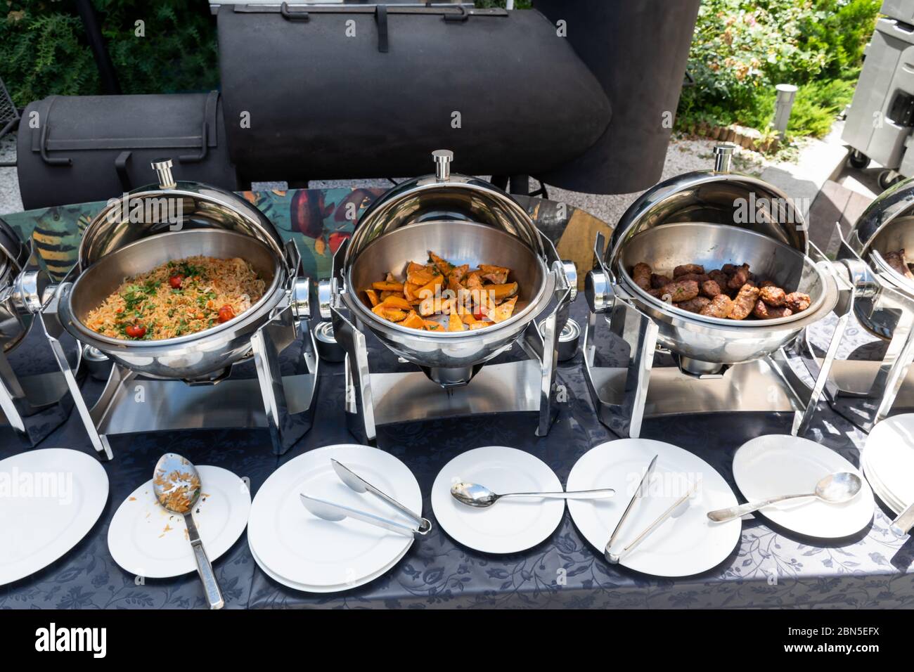 Live food stations. Kitchenware in the line catering summer brunch ...