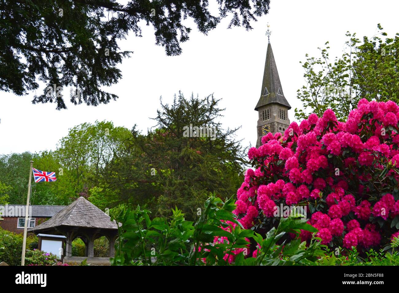 St Mary's Church, Ide Hill, Kent, UK. Unusual spire peeps above ...