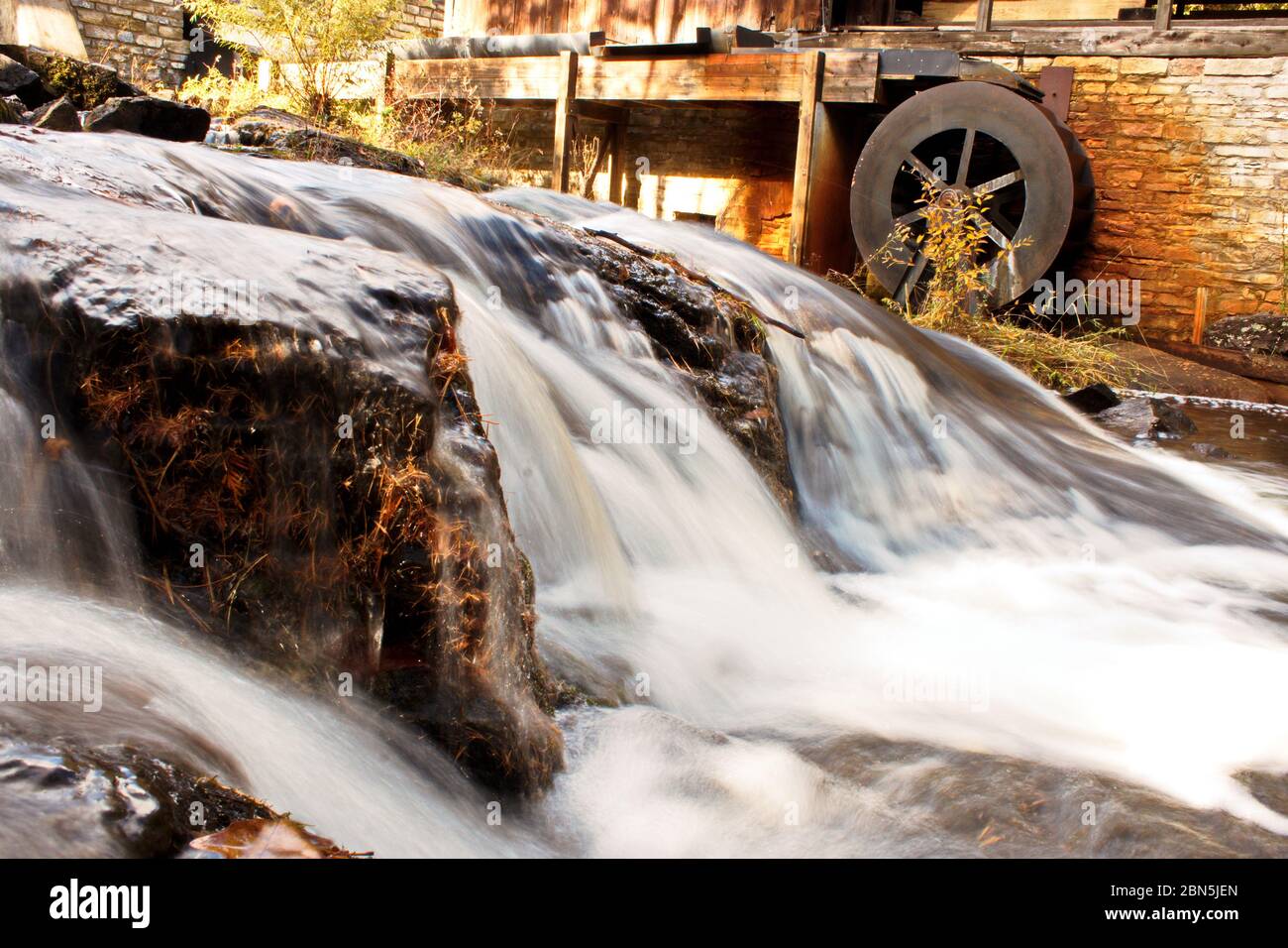 Long exposure image of water running past an old mill at O'Hara Mill ...