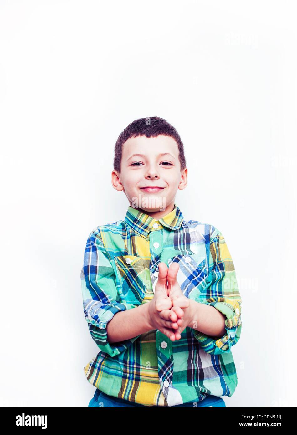 little cute real boy on white background gesture smiling close up ...