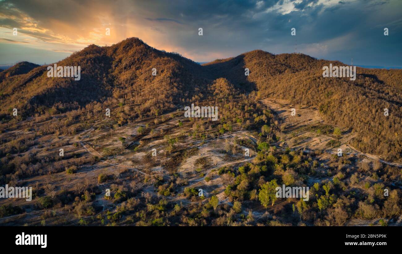 This unique photo shows the nature landscape with trees and hills from ...