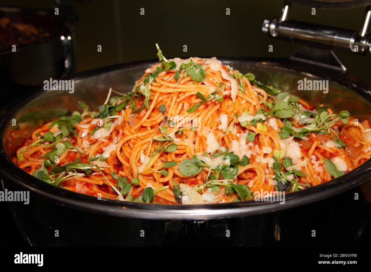 Spaghetti bolognese with tomato sauce with onions and celery served in ...