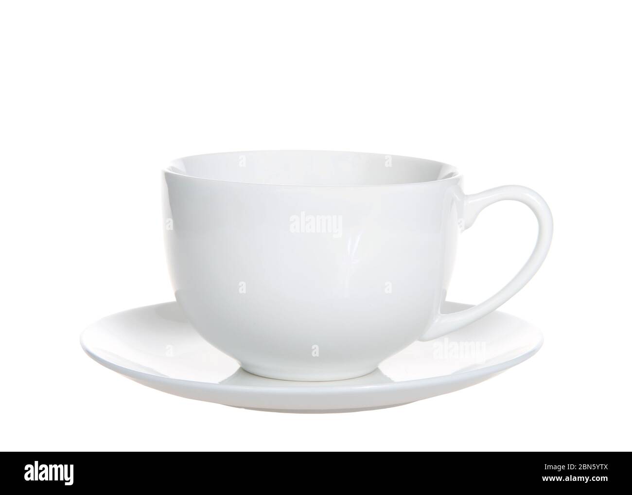 One empty off white porcelain tea coffee cup on a saucer plate isolated ...