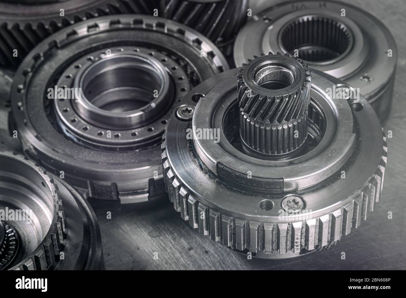 Close-up of a car gearbox. Metallic shiny gears for planetary gearshift ...