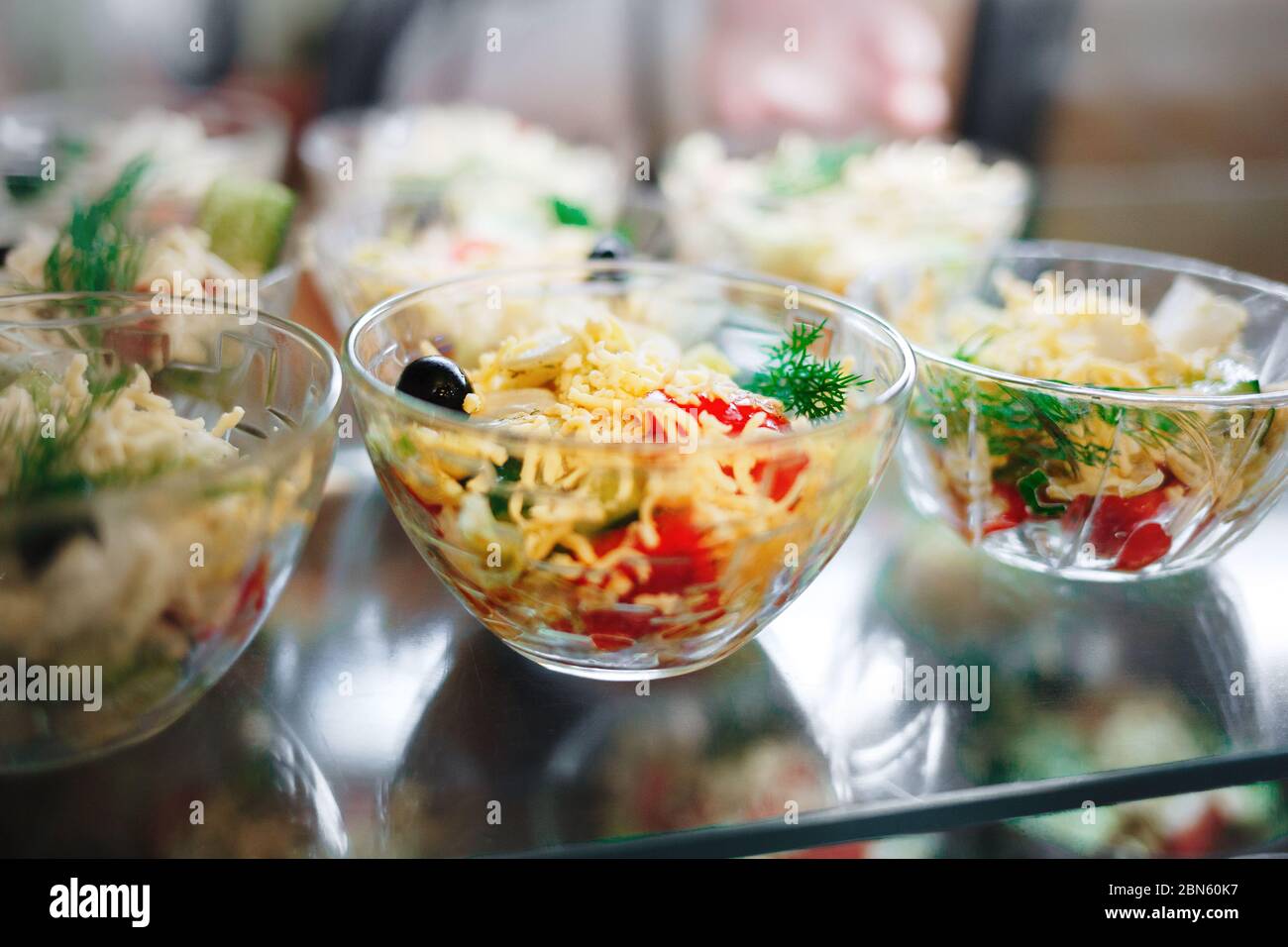 A portion of salad is on display in the public dining room. A light and ...