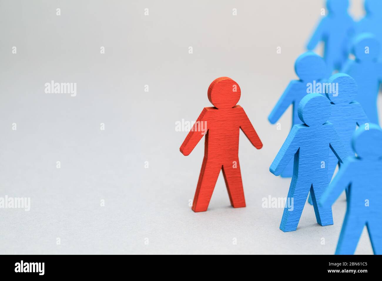 Team Leader. HR. The right choice of staff. Blue men and red leader ...