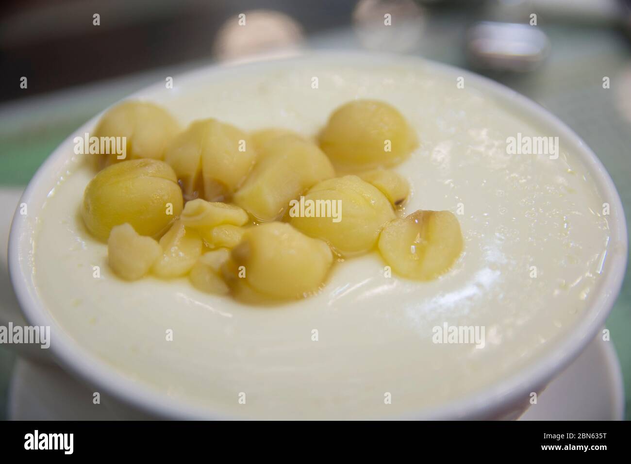 Congee, a traditional Asian rice Porridge with peeled chestnuts, Hong ...