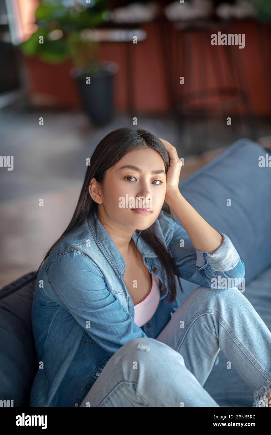 Folded knees hi-res stock photography and images - Alamy