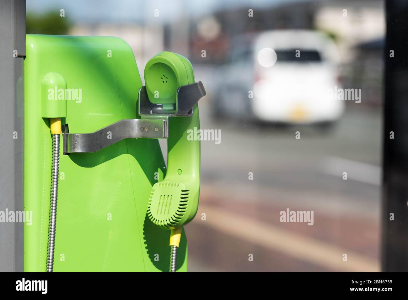 Green payphone on the street in Japan Stock Photo - Alamy