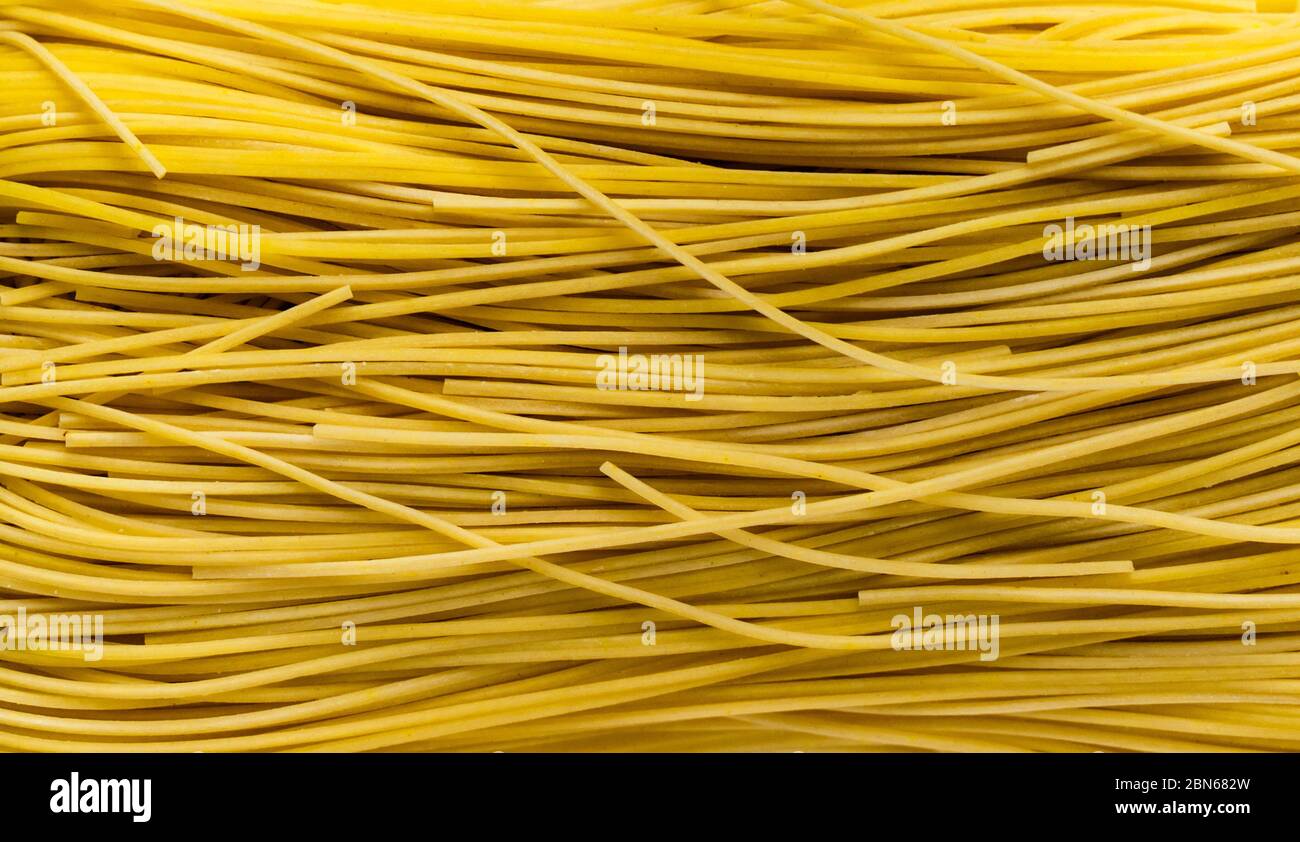 Macro dried yellow rice vermicelli or fill the frame with dried yellow ...