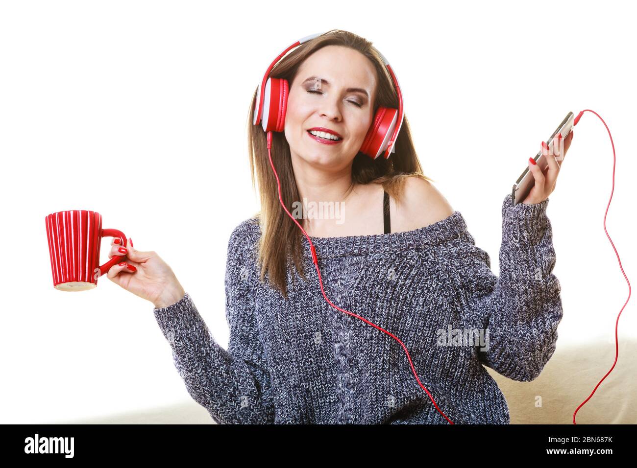 People leisure relax concept. Woman casual style red big headphones ...