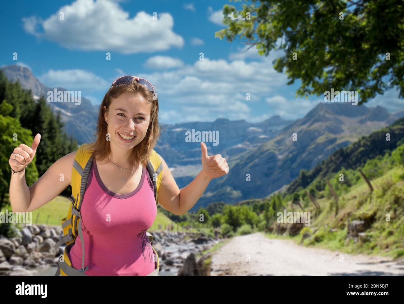pretty hiker woman with Cirque de Gavarnie, Hautes-Pyrenees, France ...