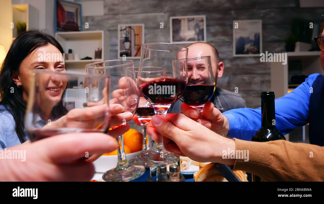 Shot glasses clinking hi-res stock photography and images - Alamy