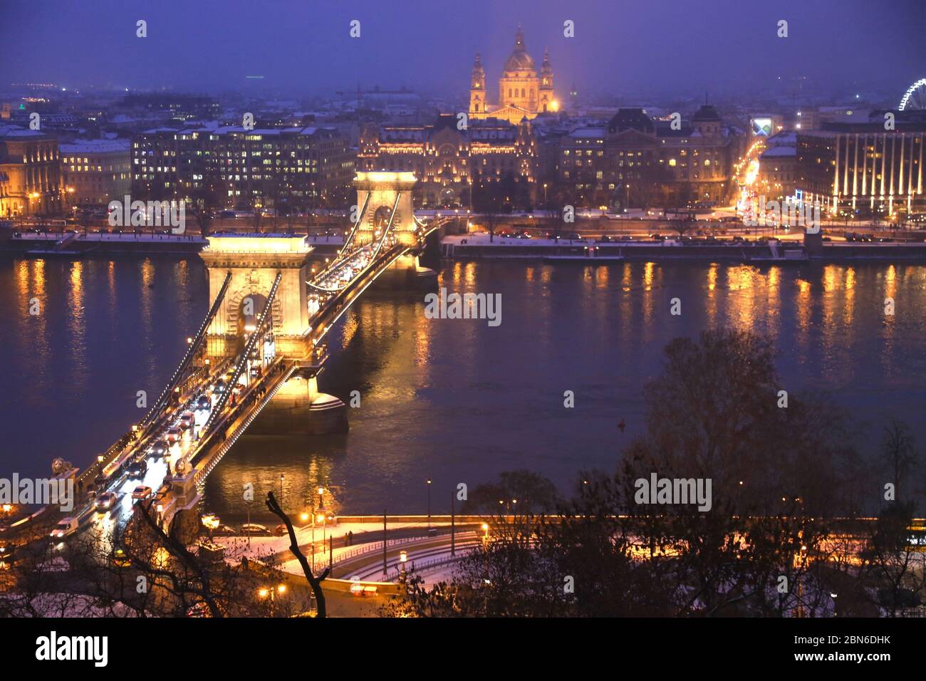 The night view of chain bridge and Saint Stephen Basilica in Budapest ...