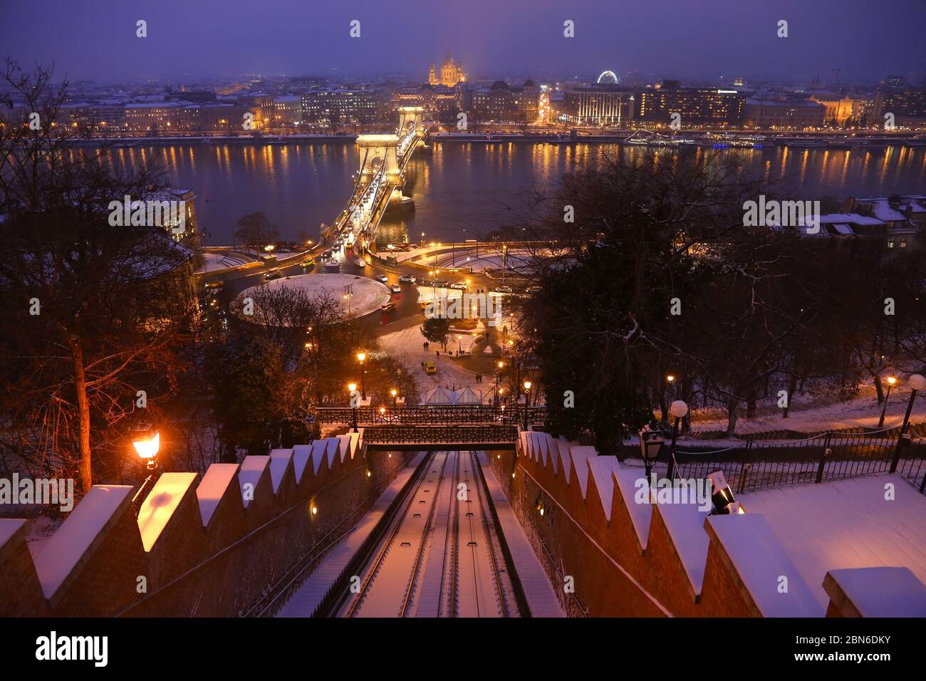 The night view of chain bridge and Saint Stephen Basilica in Budapest ...