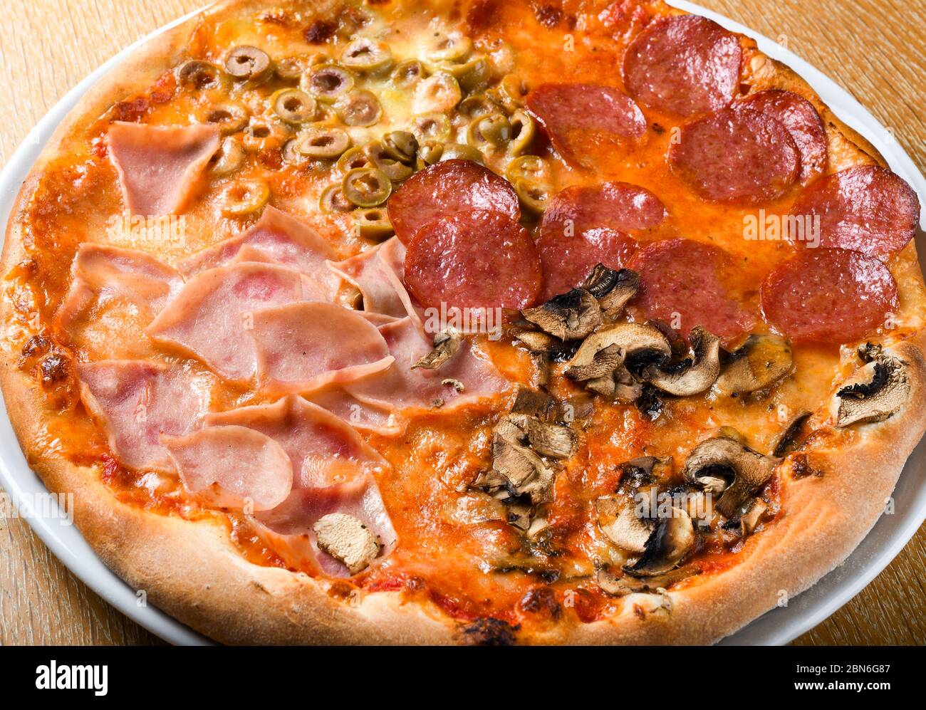 Pizza quattro stagioni is a variety of pizza in Italian cuisine that is ...