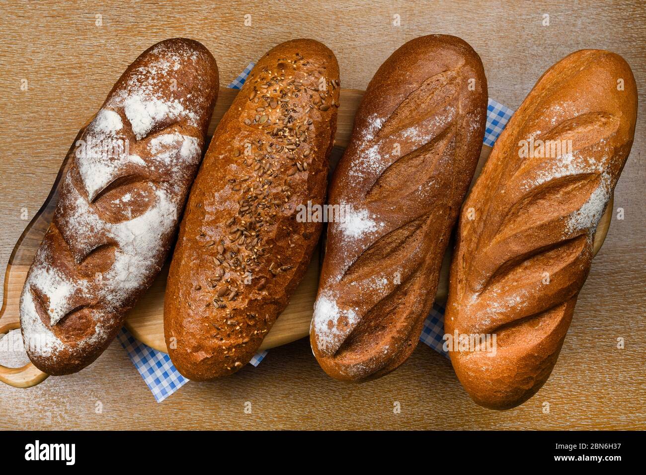 Many mixed breads and rolls shot from above. Top view of assortment of ...
